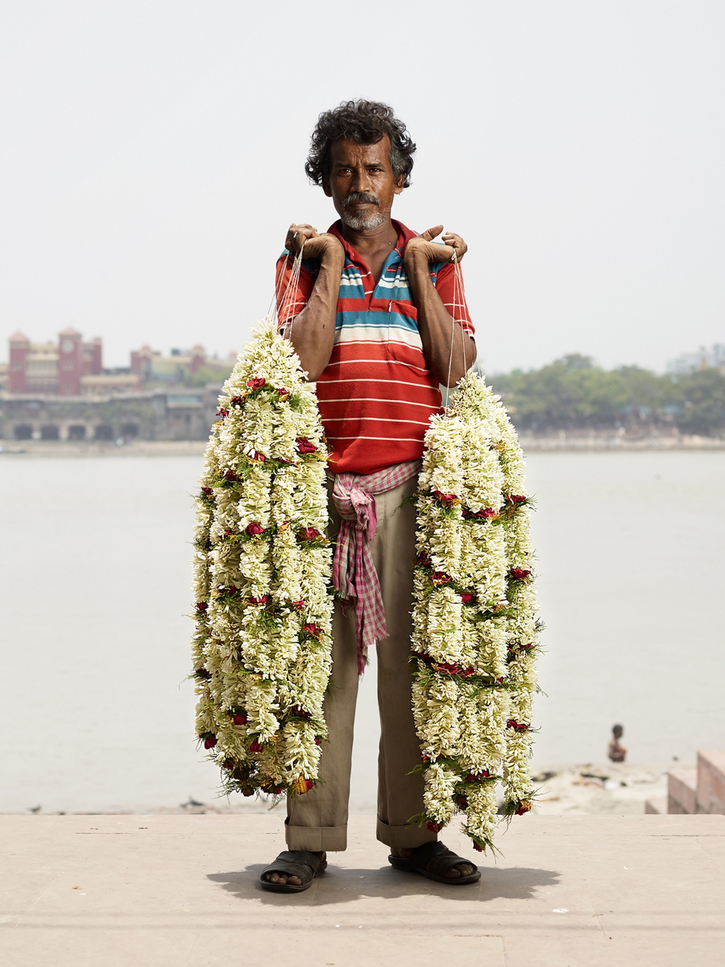 In a Kolkata Market, the Flower Men Wear Their Wares
