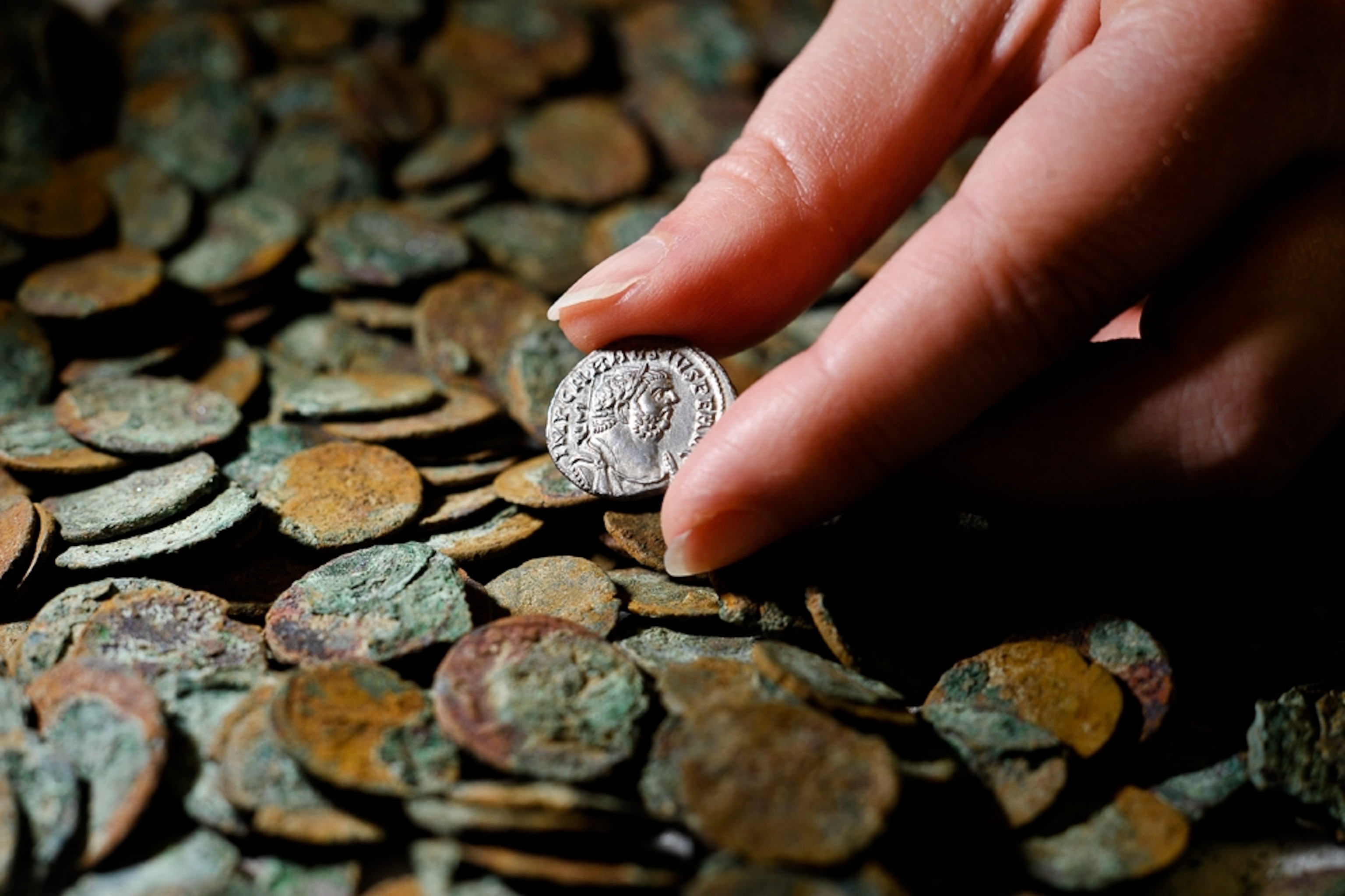 Pictures: Gold Treasure, Roman Coins Revealed in U.K.
