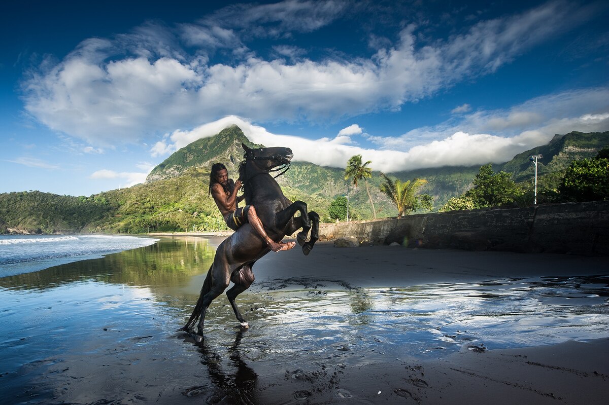 Pictures of horsemen on the Marquesas Islands, French Polynesia