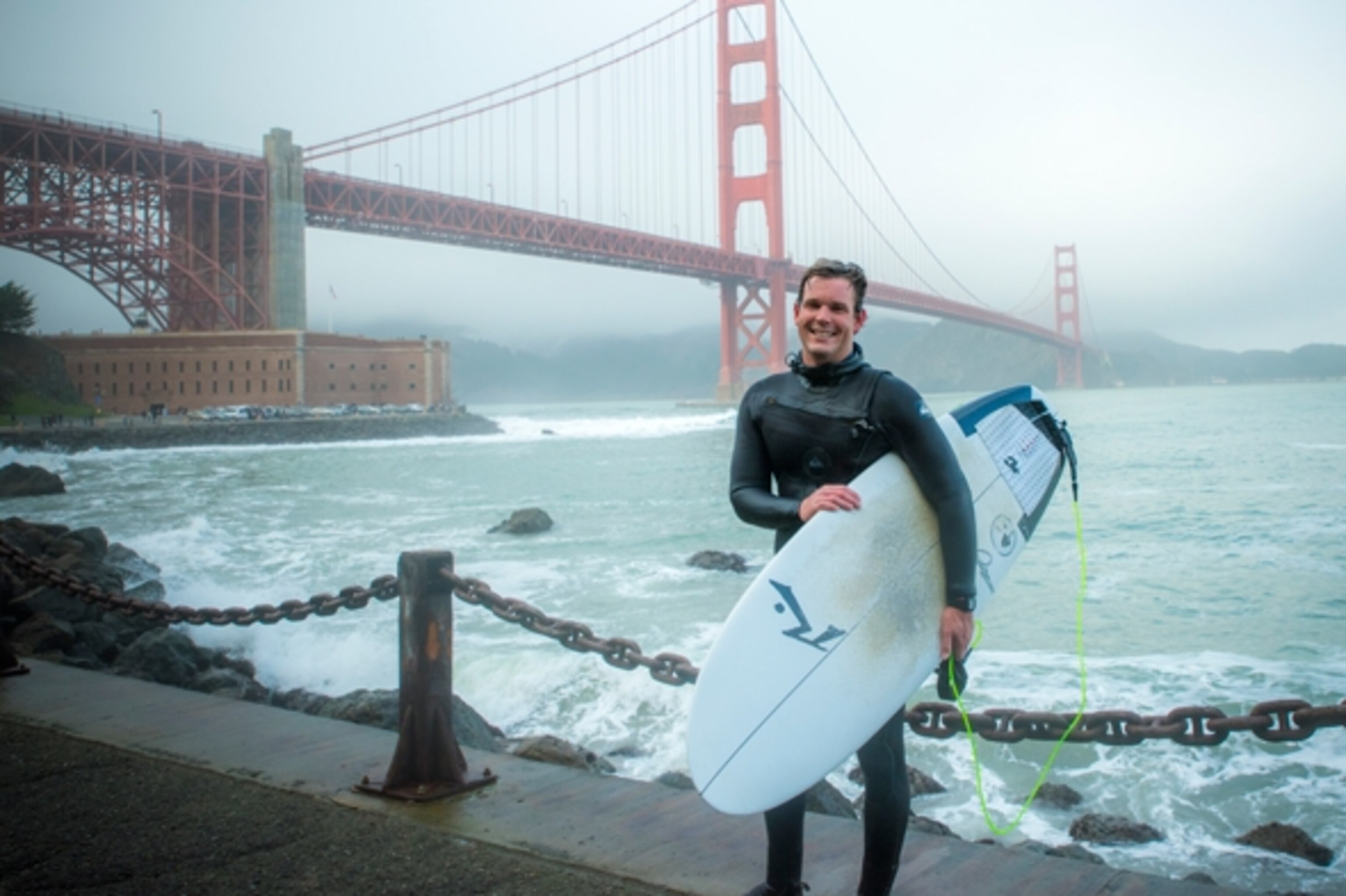 California Surfers Ride Waves in San Francisco Under the Golden Gate Bridge