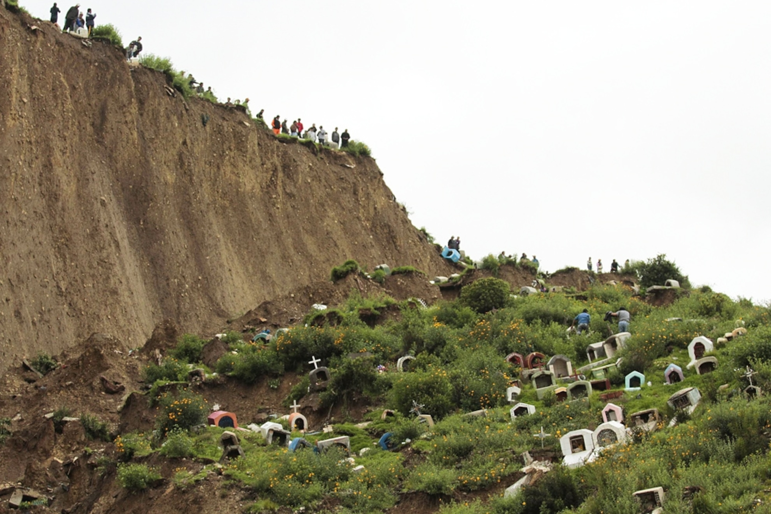 Bolivia Landslide Photos: Neighborhoods, Cemetery Fall