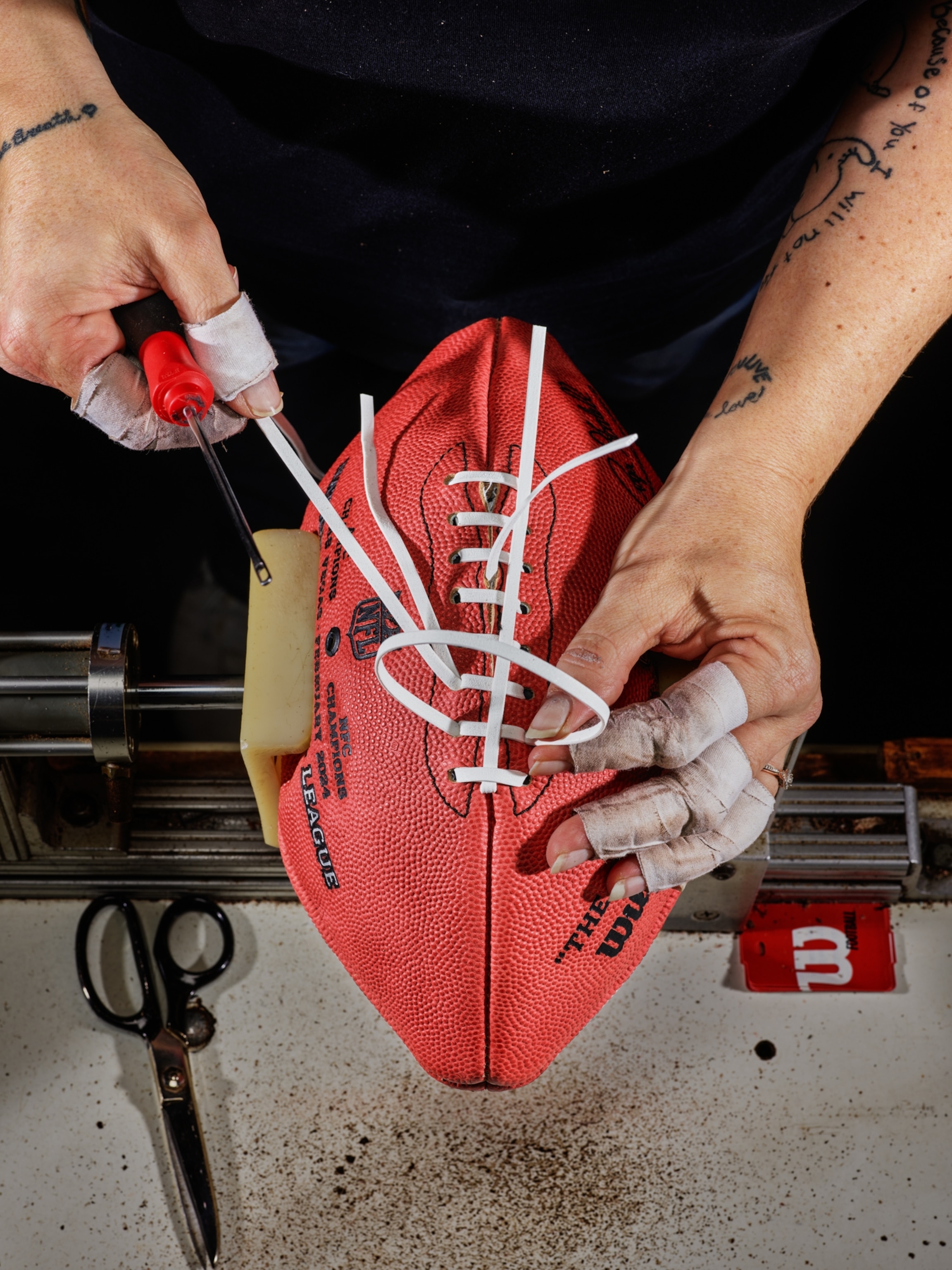 Step inside the factory where the NFL’s footballs are made