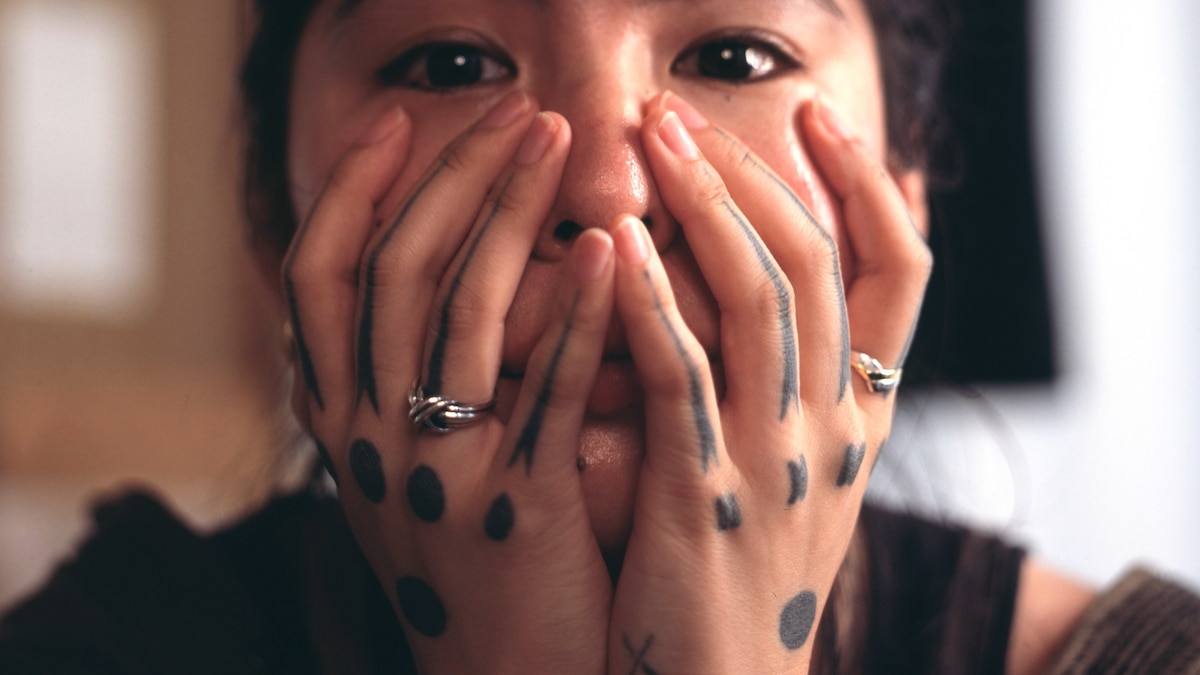 These sacred tattoos were banned in Okinawa. A new generation is ...