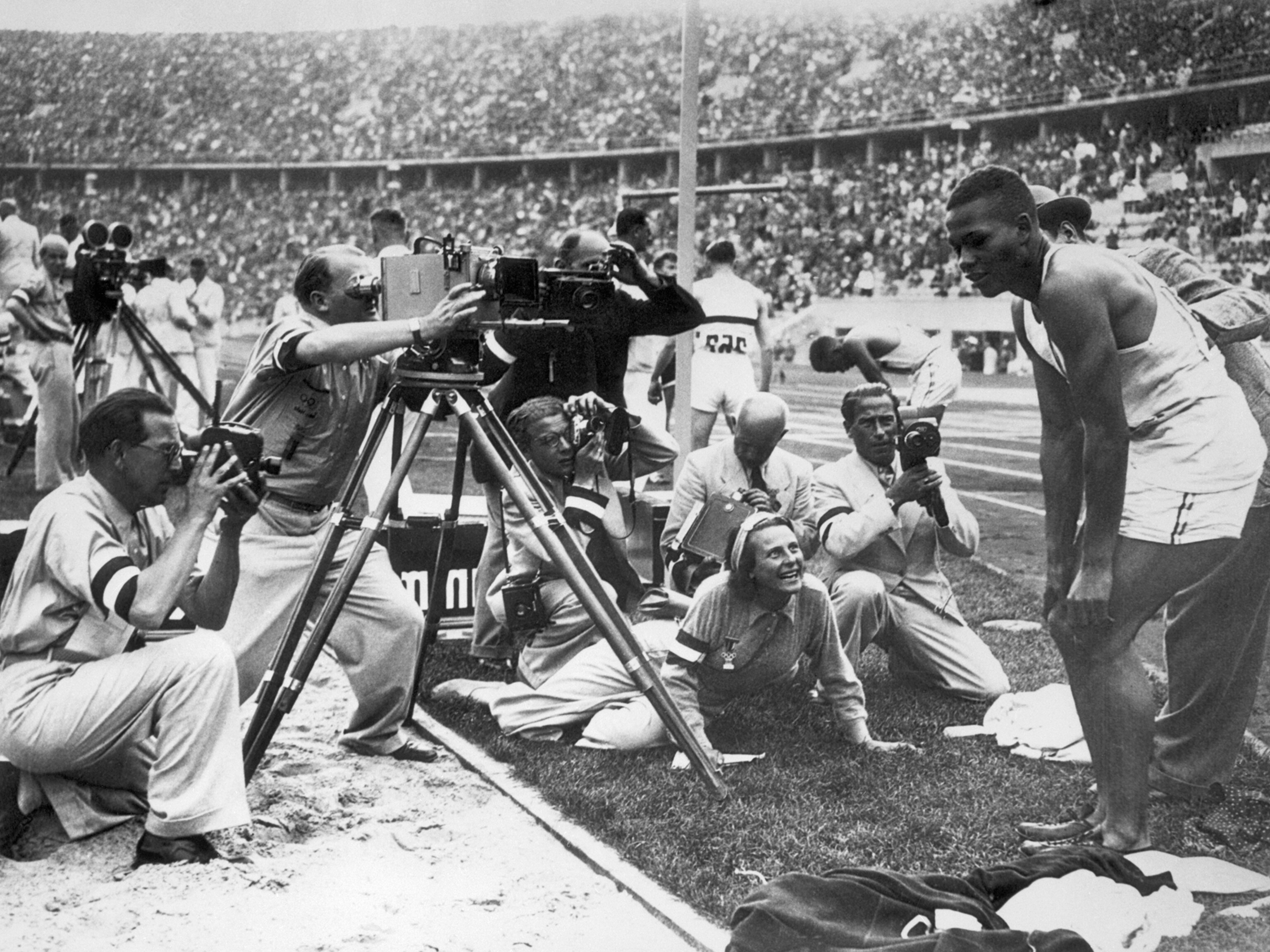 There's a Dark History Behind the Glittering Olympic Games