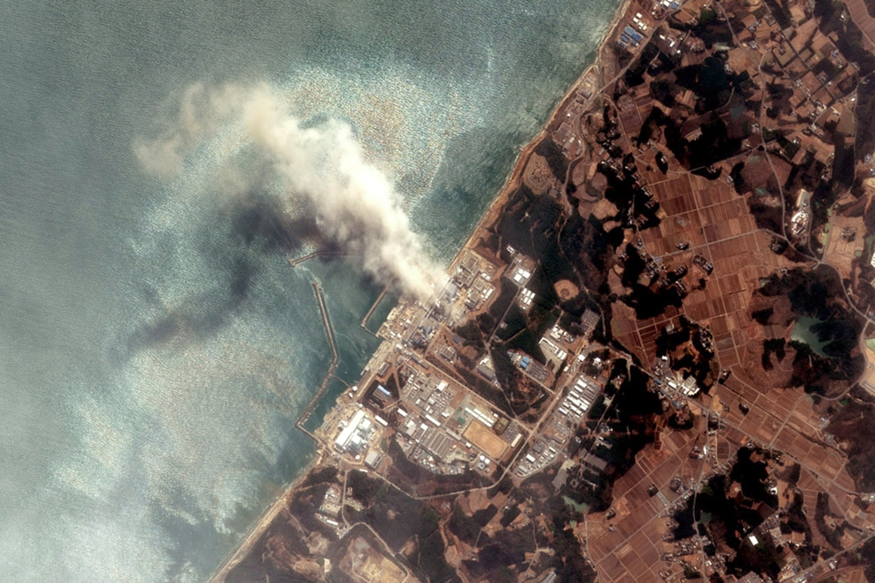 Japan Reactor Crisis: Satellite Pictures Reveal Damage