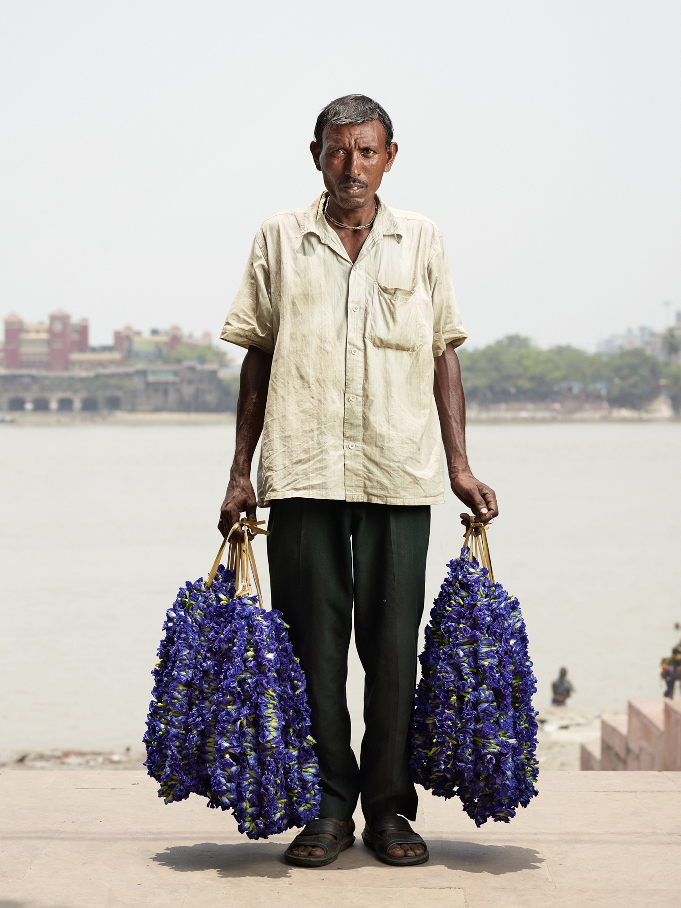 In a Kolkata Market, the Flower Men Wear Their Wares
