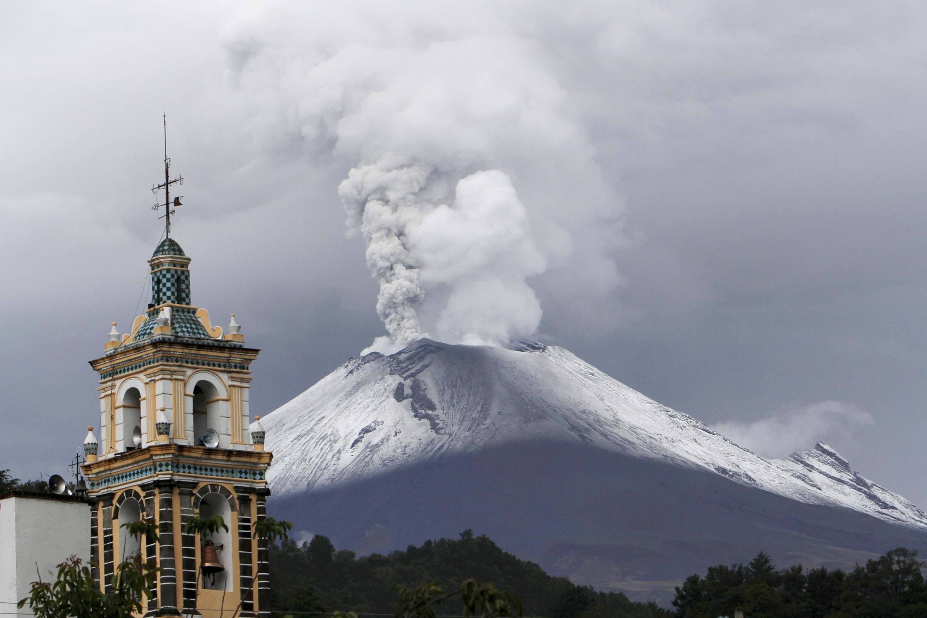 Pictures: Mexico Volcano Spews Ash 2 Miles High