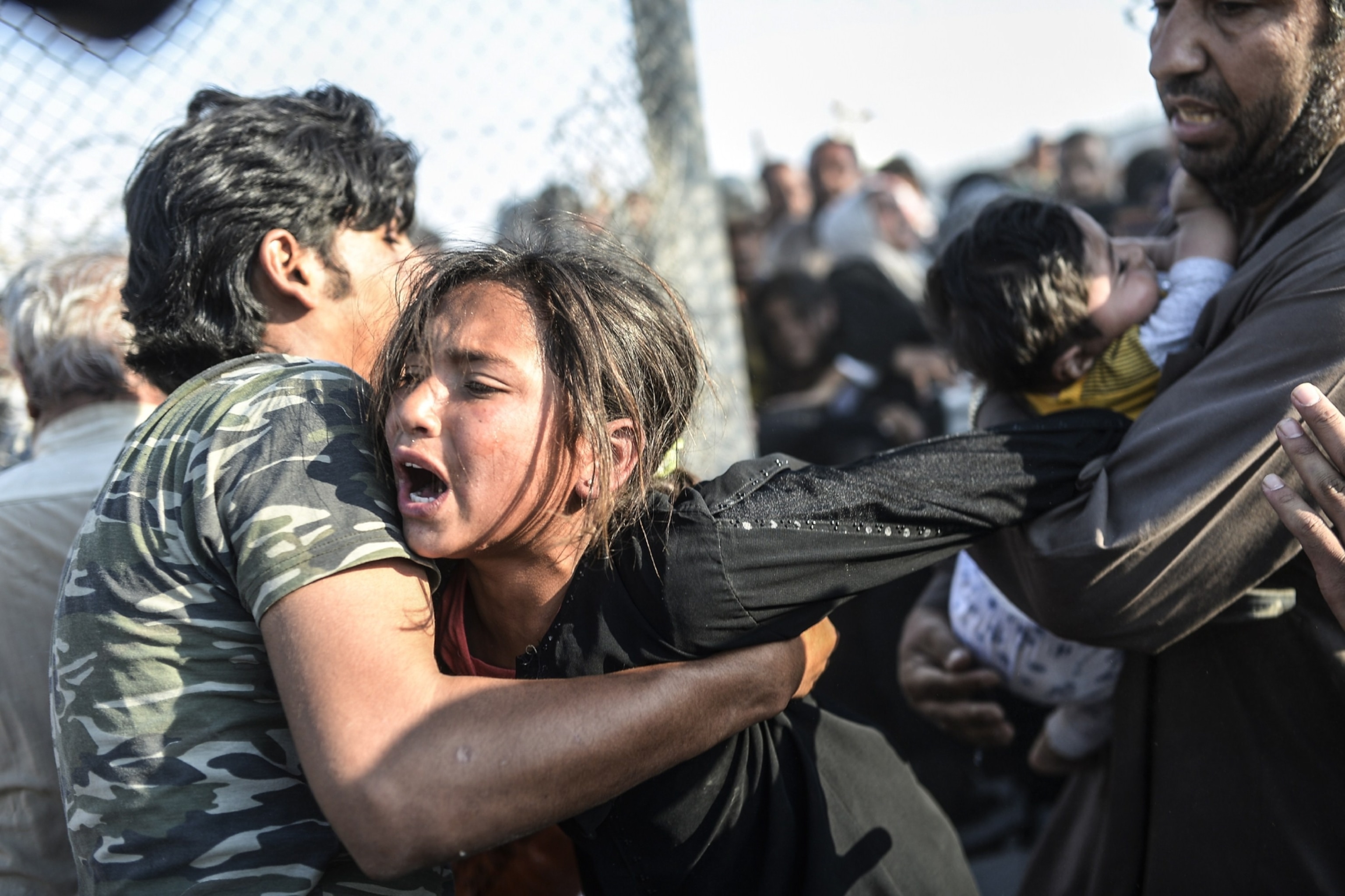 11 Heart-Wrenching Pictures Bring Refugee Crisis to Life