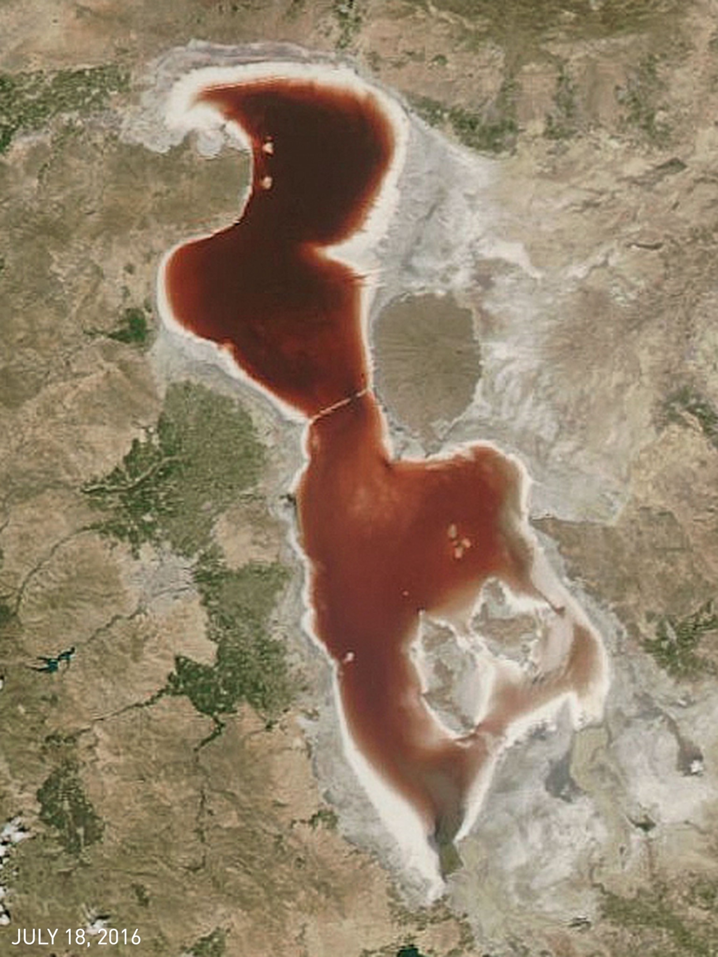 Why a Giant Green Lake Turned Blood-Red