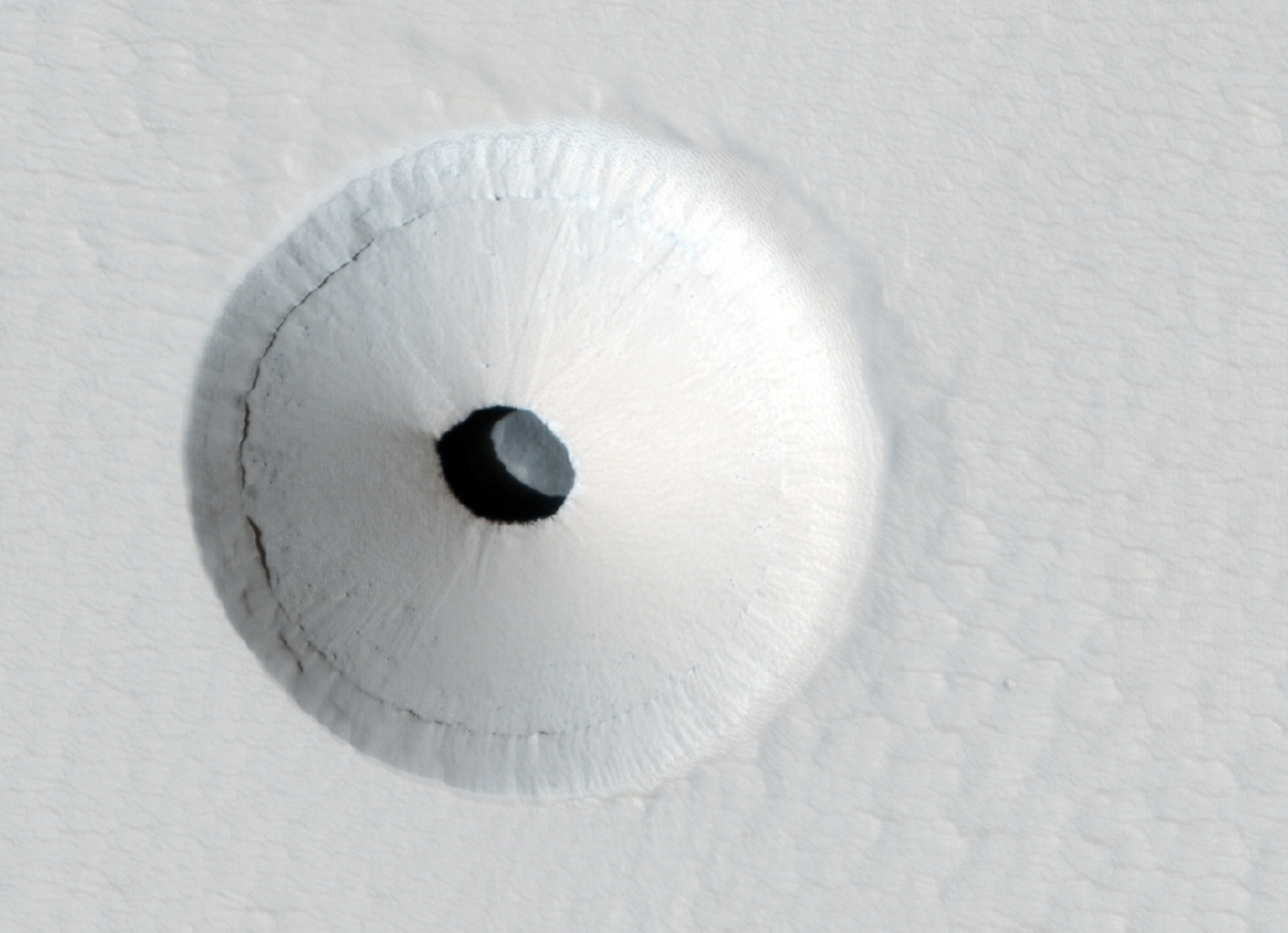 Space Pictures This Week: Mars Pit, Warped Galaxy, More | National ...