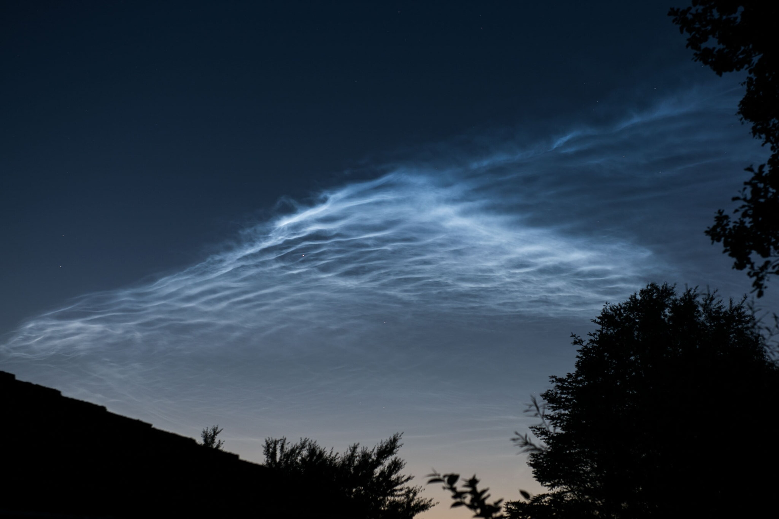 Eerie Clouds Glow at Night—How to See Them