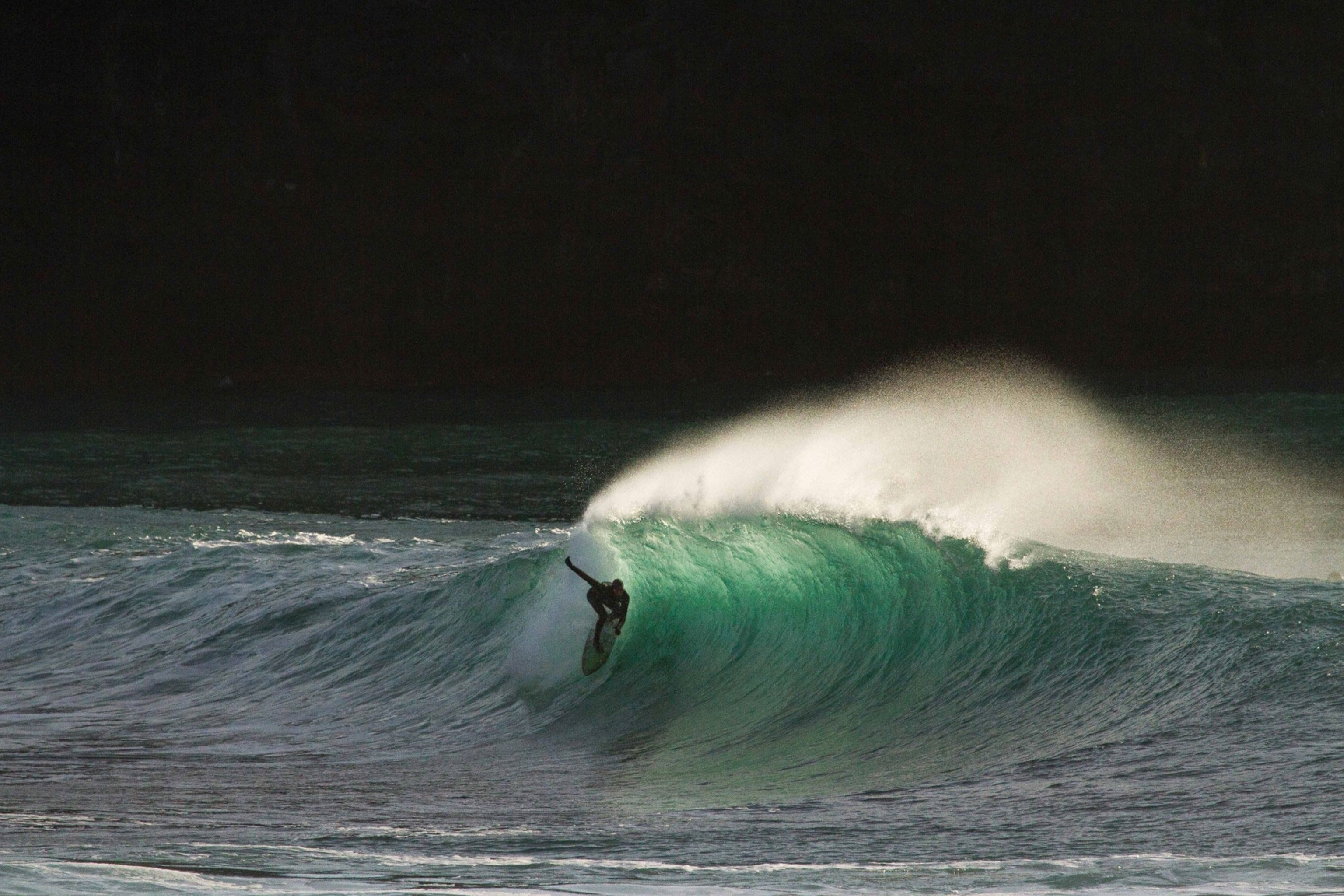 Surfers in Ireland Ride Cold Waves in Lahinch, Ireland