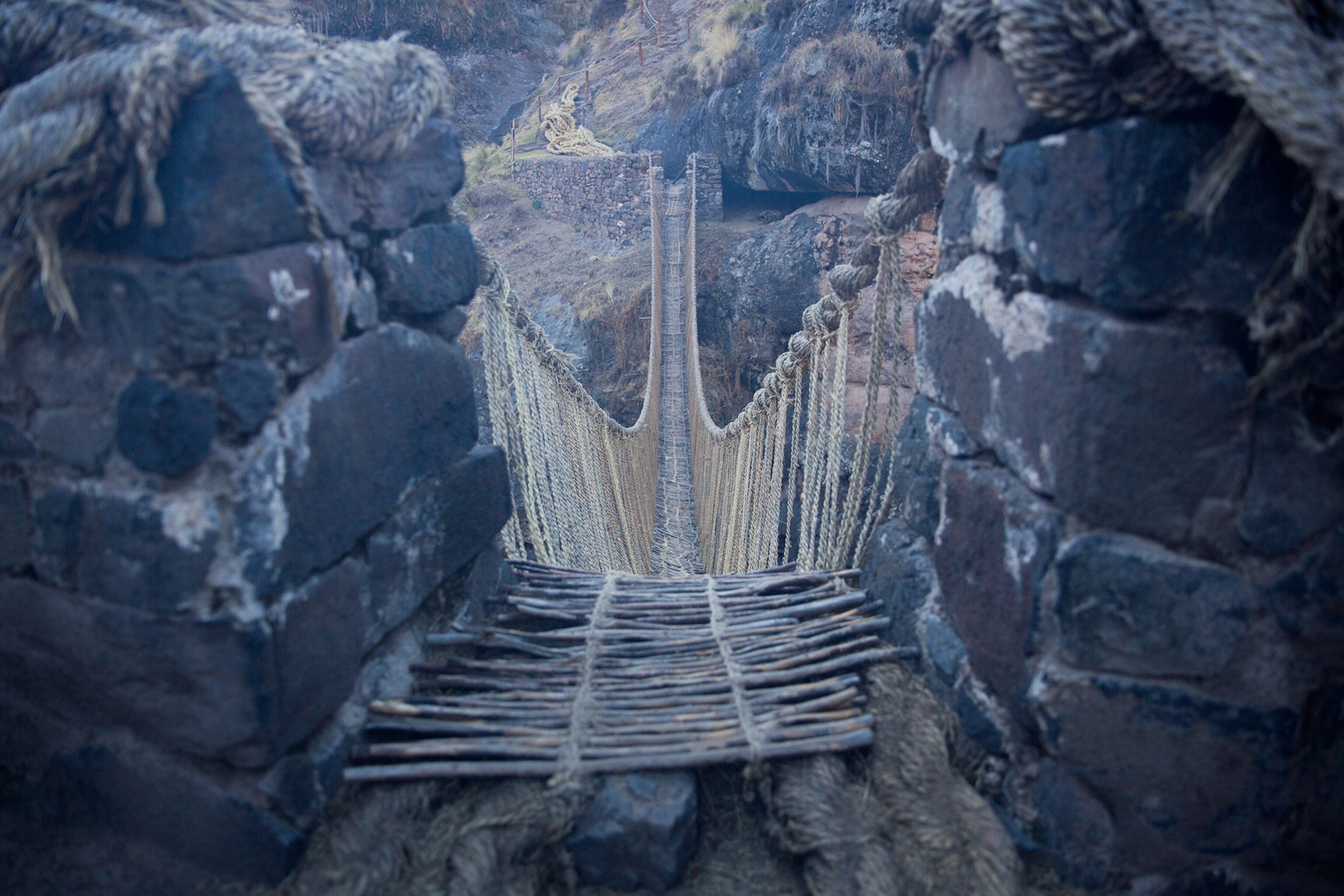 Photos of the Last Incan Suspension Bridge in Peru