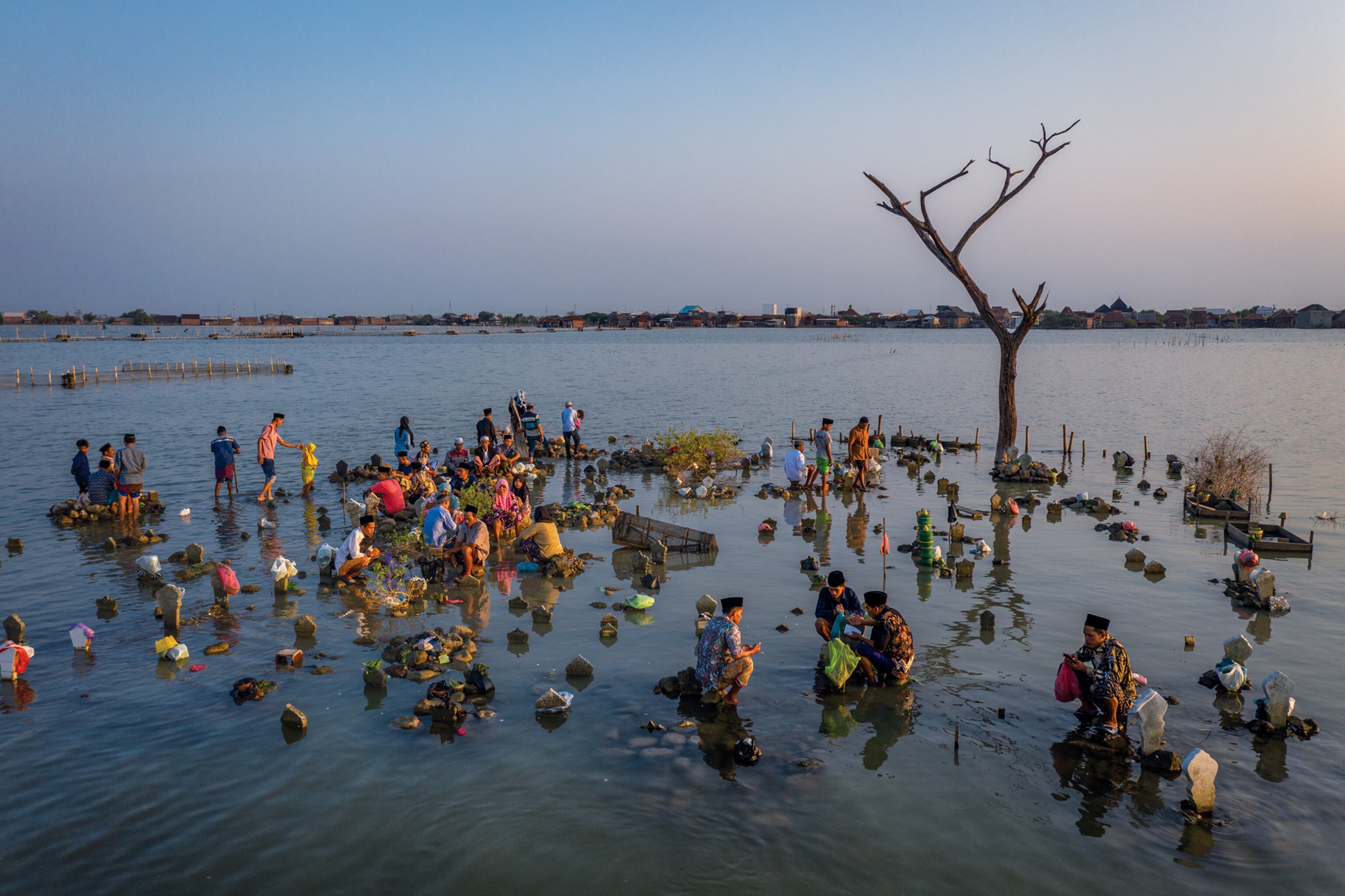 Their homes are sinking fast. Can their community survive?
