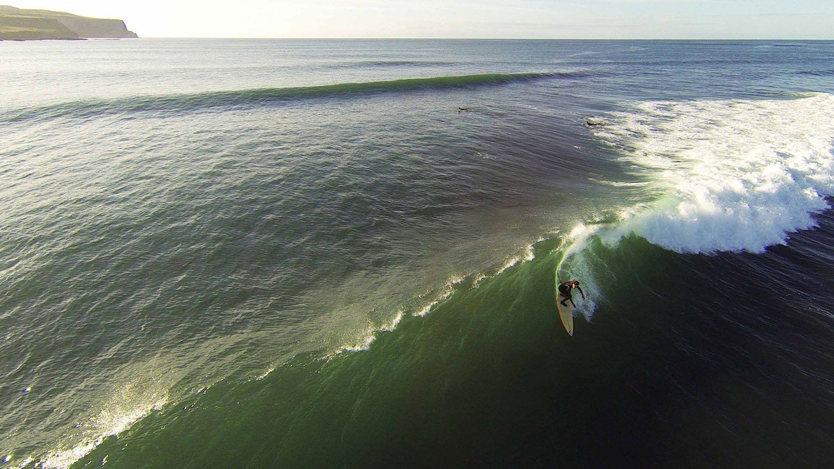 Surfers in Ireland Ride Cold Waves in Lahinch, Ireland | National ...