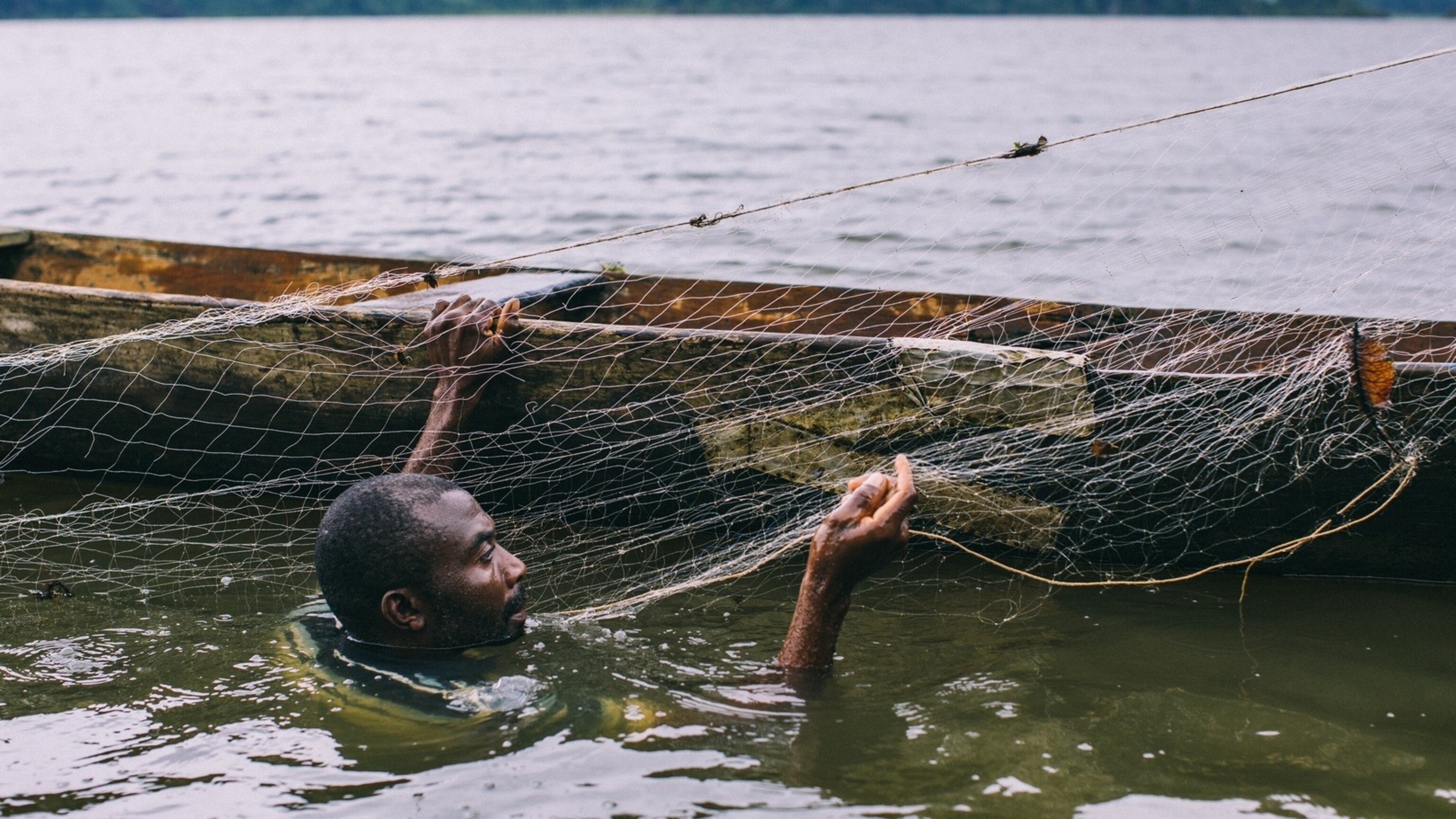Fisherman Fishing Net