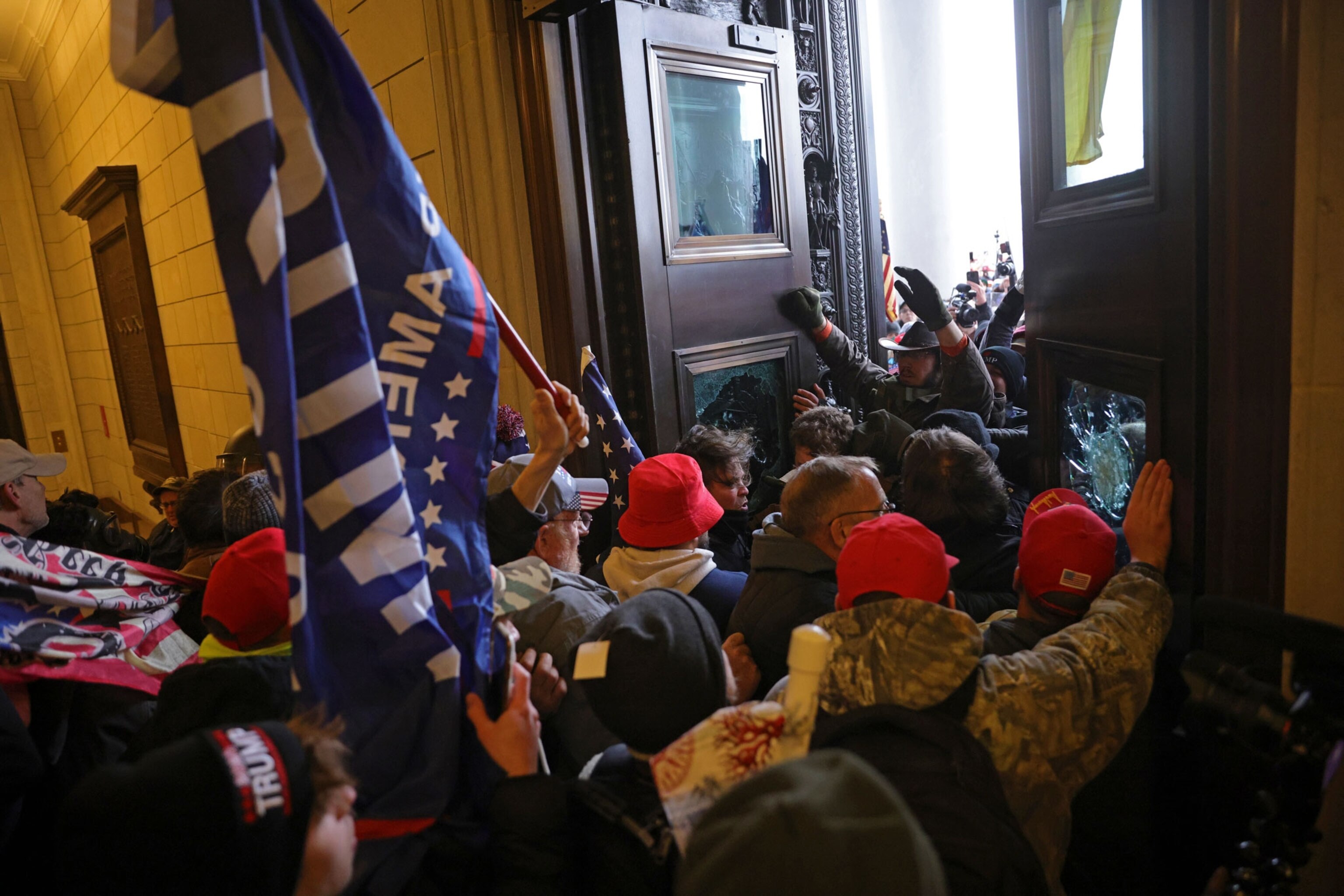 A historic day in photos: from a pro-Trump insurrection to a pre-dawn ...