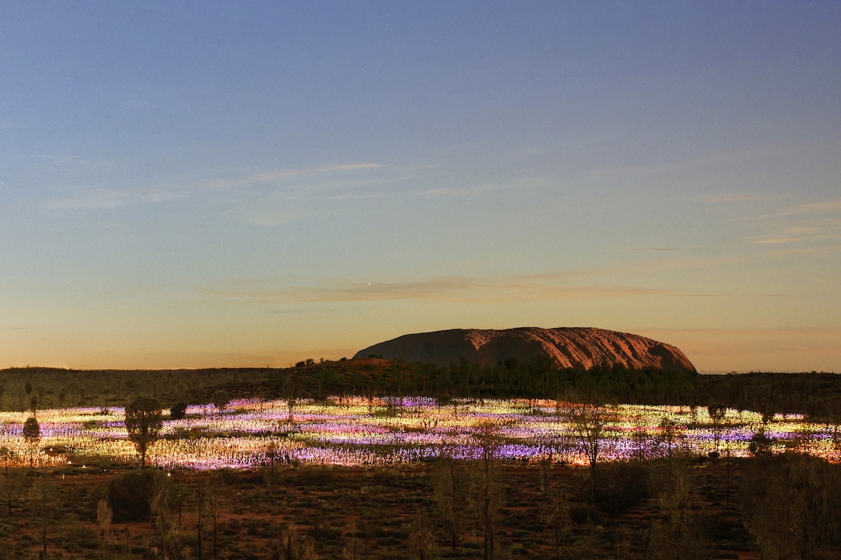 Dazzling Light Display Illuminates Australia's Iconic Rock