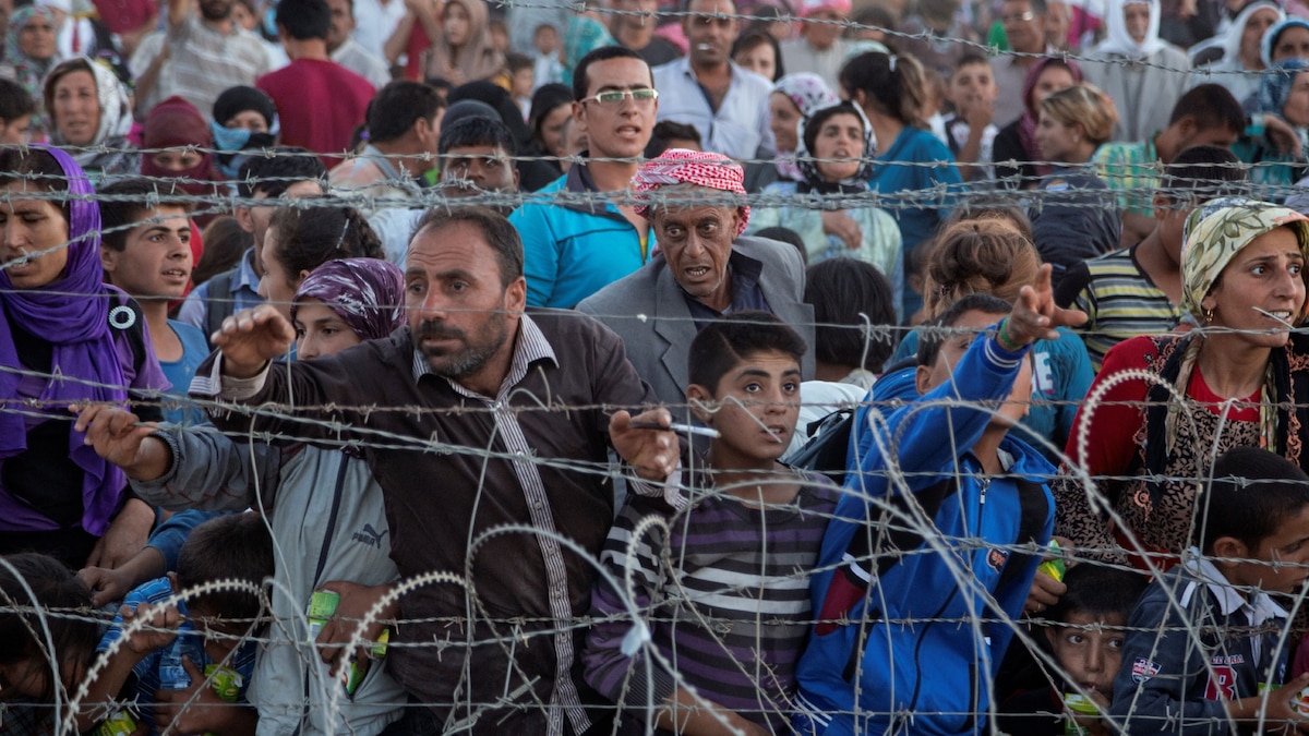 Fleeing Terror, Finding Refuge | National Geographic